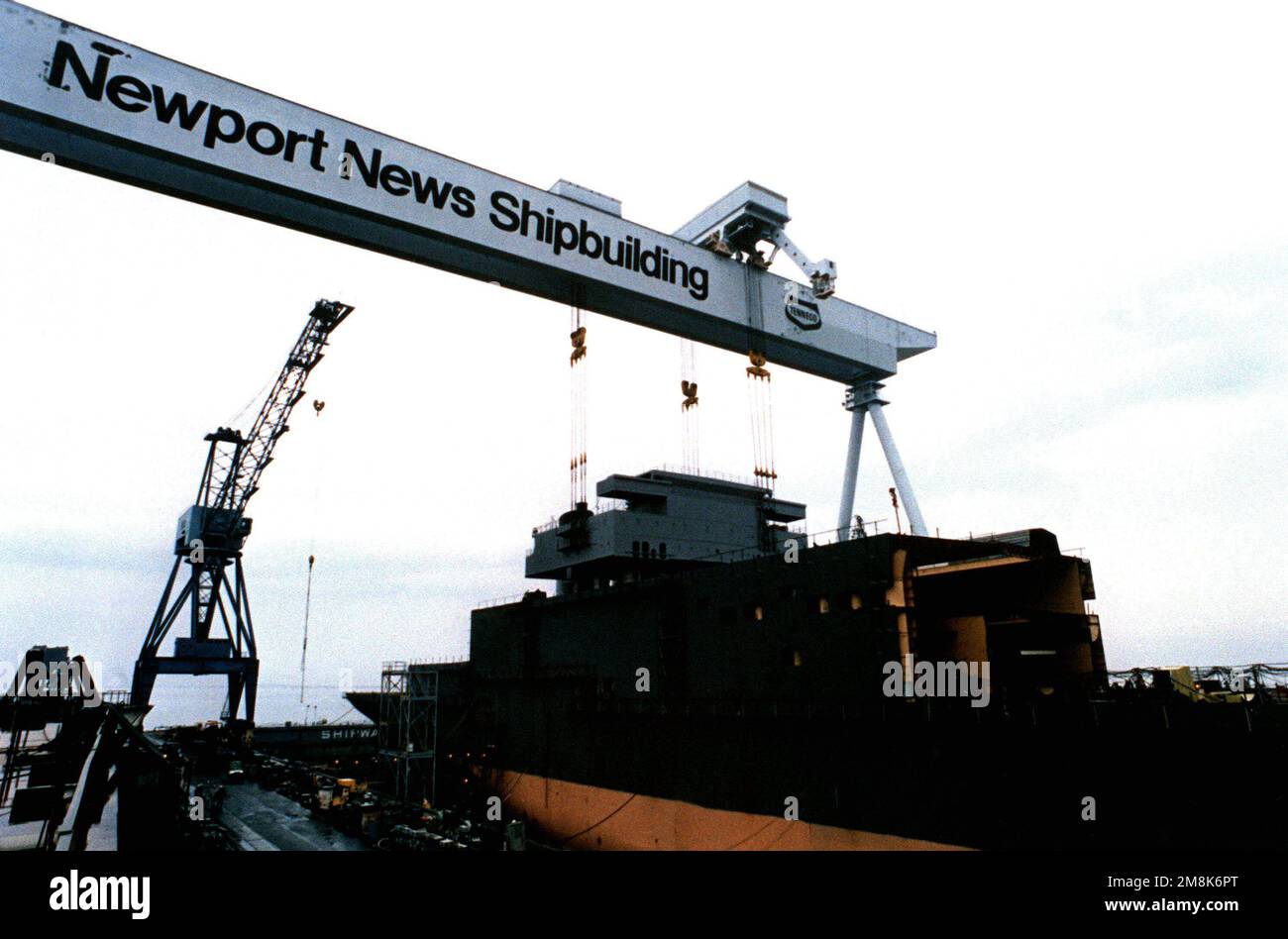 New cargo ship lowered hi-res stock photography and images - Alamy