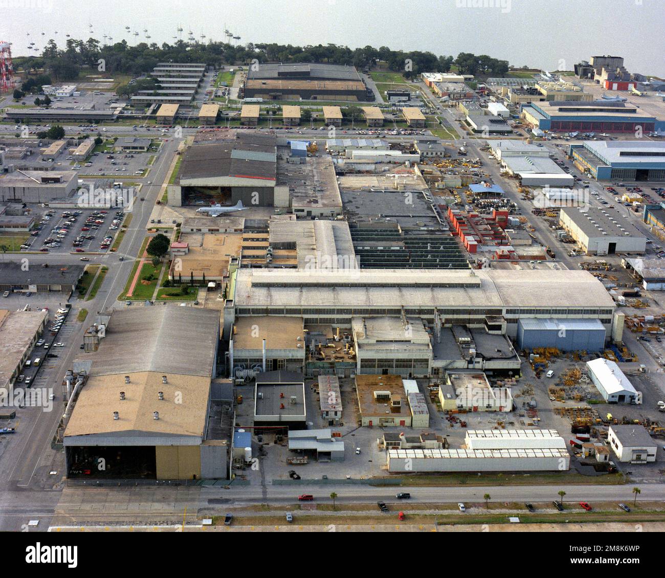 An aerial view of the Naval Aviation Depot (NADEP) Jacksonville looking ...