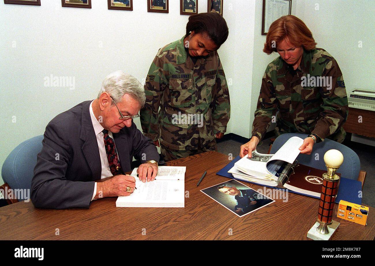Retired CHIEF MASTER Sergeant of the Air Force, Paul W. Airey, signs ...