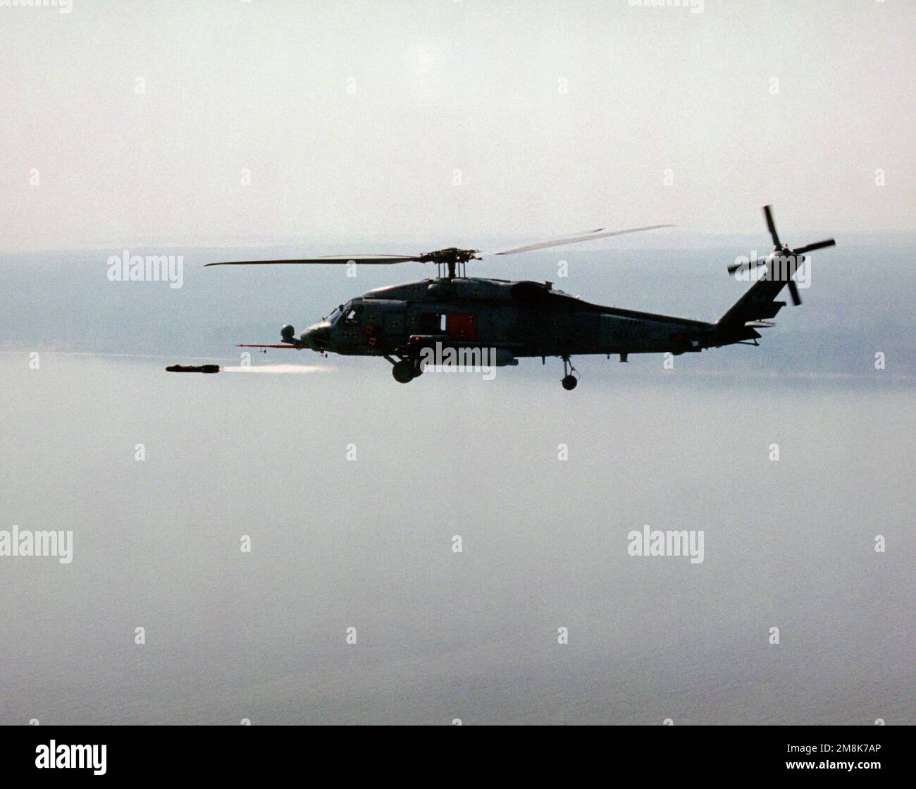 A Hellfire laser-guided anti-armor missile is successfully launched ...