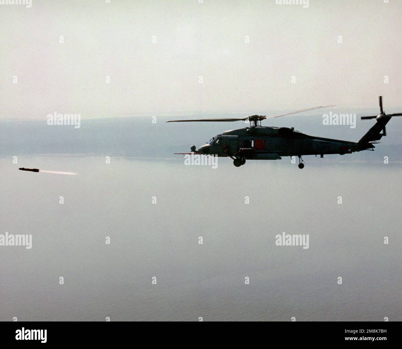 A Hellfire missile speeds toward the target after being successfully ...