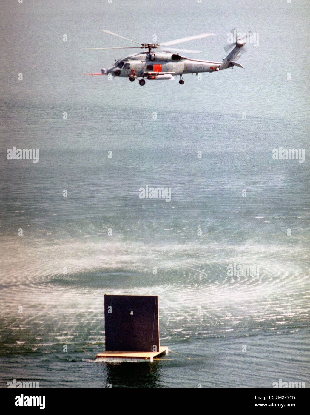 An SH-60F Seahawk helicopter from the Naval Air Warfare Center Aircraft ...