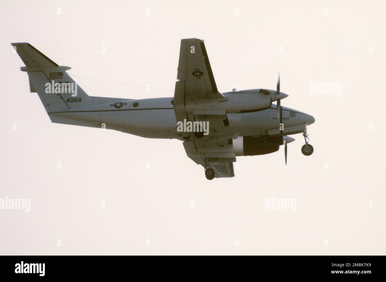 An overhead view of a C-12J just after take-off. Base: Osan Air Base ...