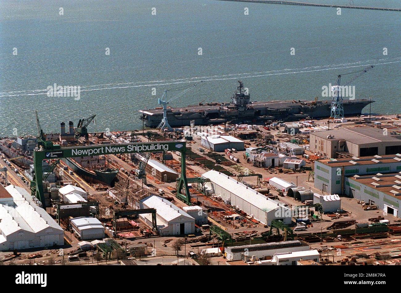 A starboard side view of the nuclear-powered aircraft carrier USS ...