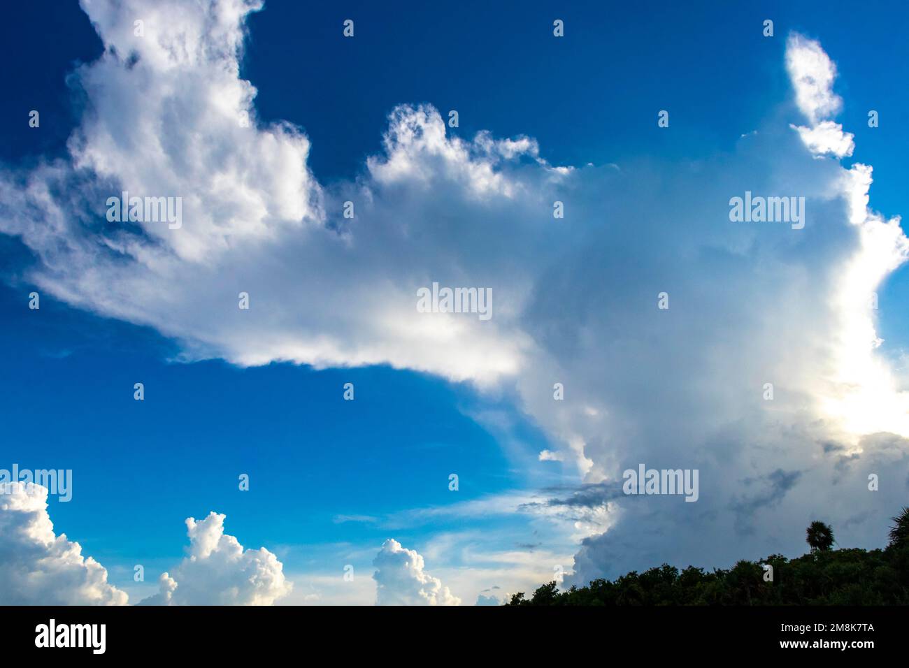 Explosive cloud formation cumulus clouds in the sky in Playa del Carmen ...