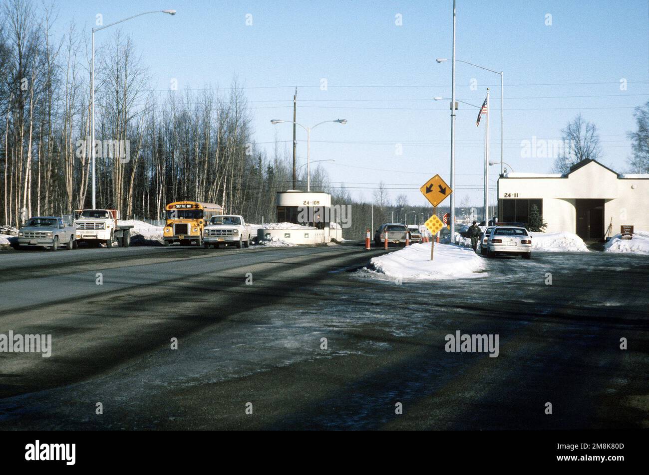 A long-range view of the main gate. Base: Elmendorf Air Force Base ...