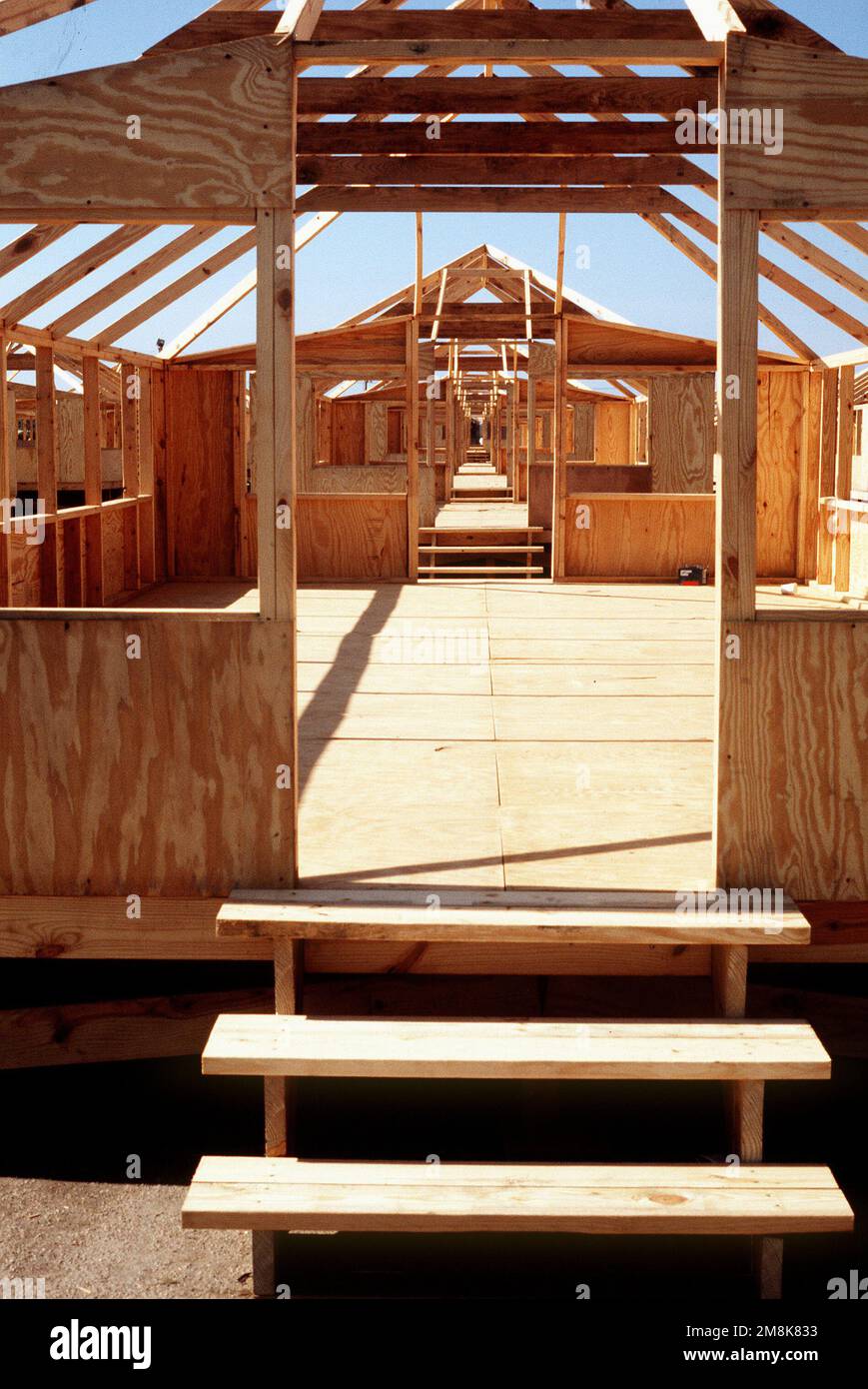 A close-up view of a hard back tent frame at Camp Five. U.S. Navy ...