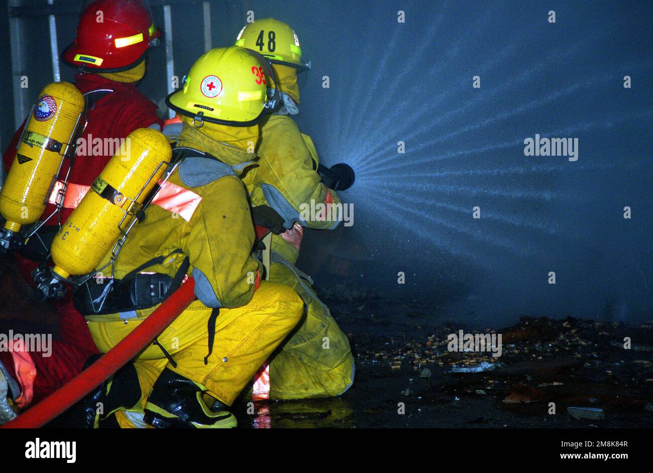 Firefighters Aviation Boatswain's Mate (Aircraft Handler) First Class ...