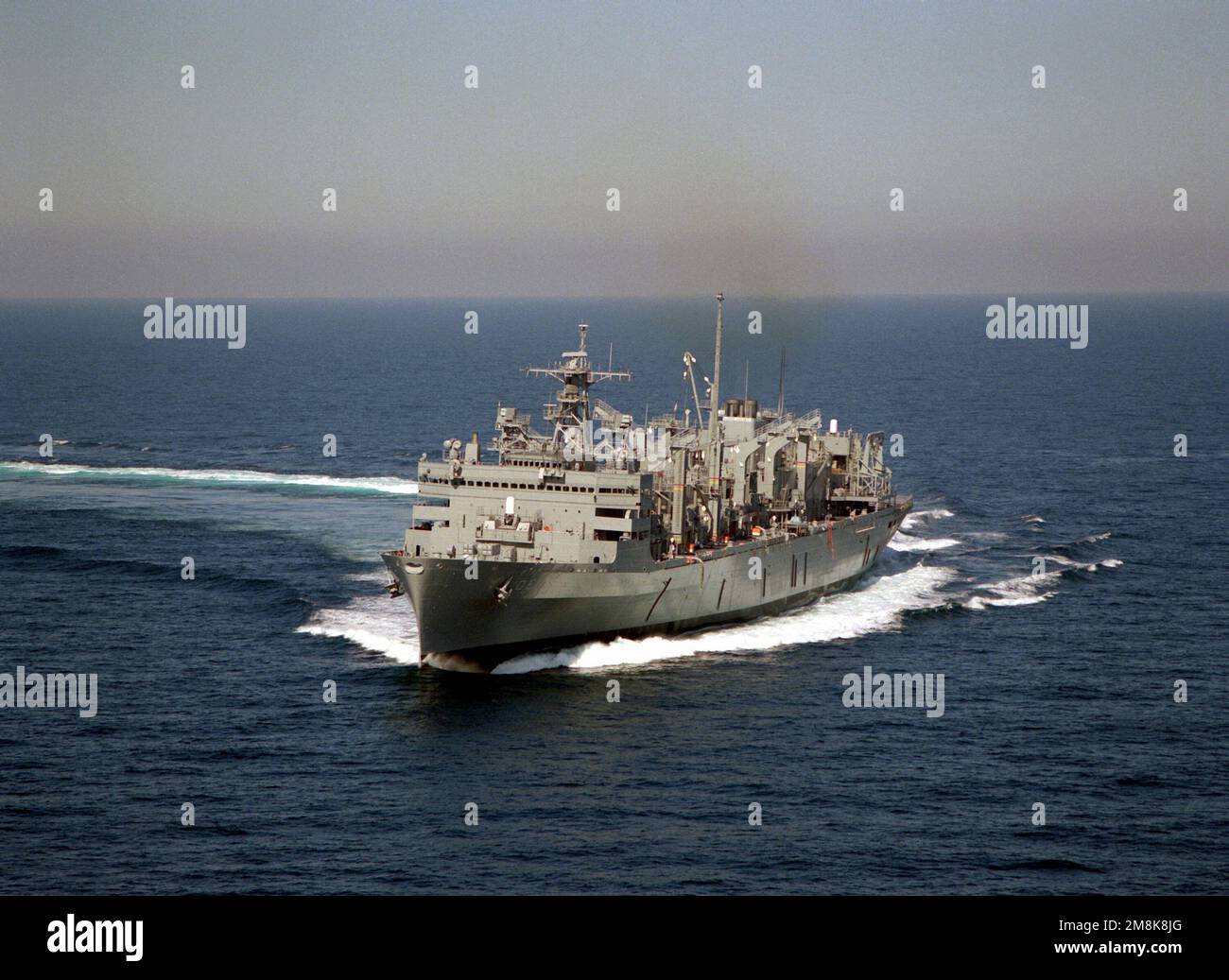 A port bow view of the fast combat support ship USS ARCTIC (AOE-8 ...