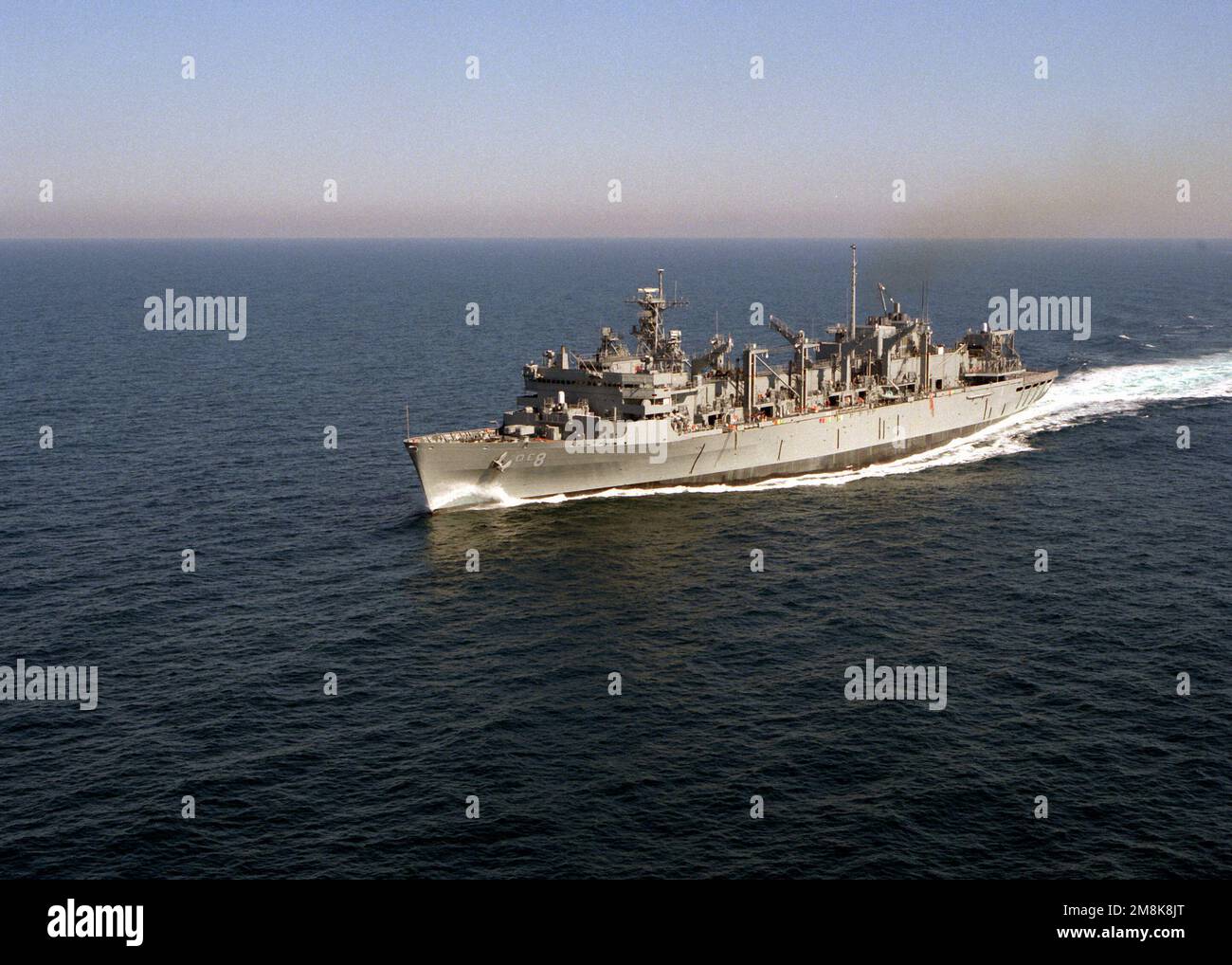 An aerial port bow view of the fast combat support ship USS ARCTIC (AOE ...