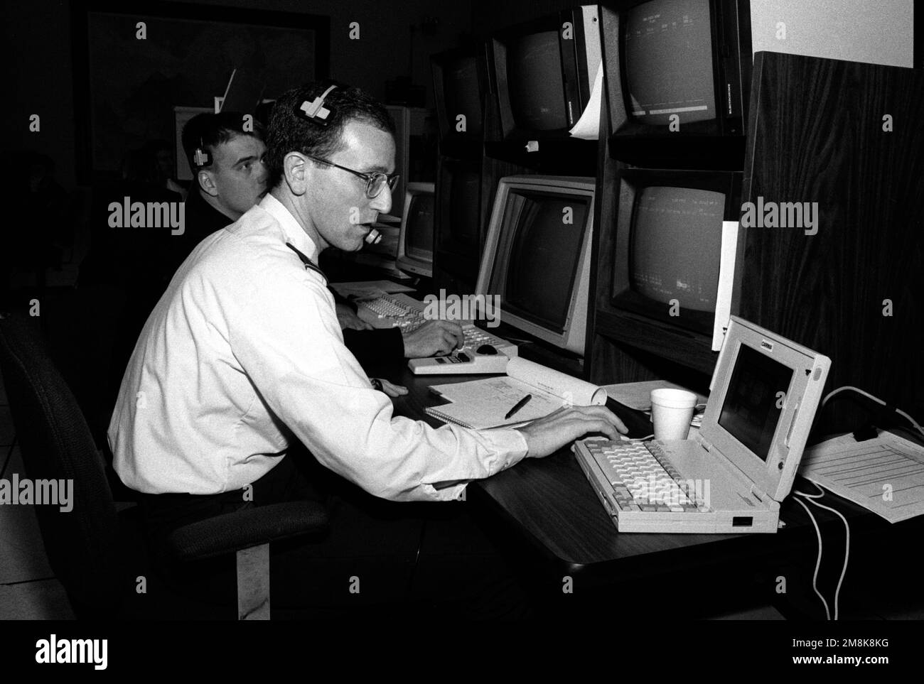 Operations SPECIALIST Second Class (OS2) Howard Fuller, left, and Air ...