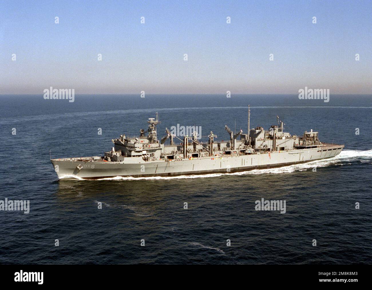 An aerial port side view of the fast combat support ship USS ARCTIC ...