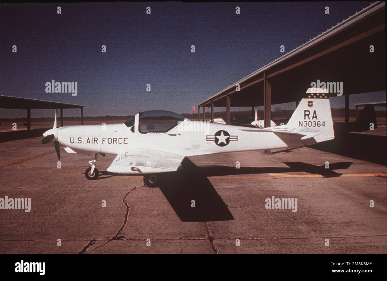 A left side view of a T-3A on the flight line. Base: Randolph Air Force ...