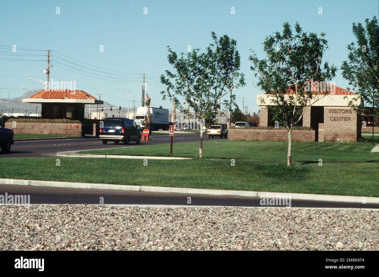 A medium-range view of the main gate. Base: Nellis Air Force Base State ...