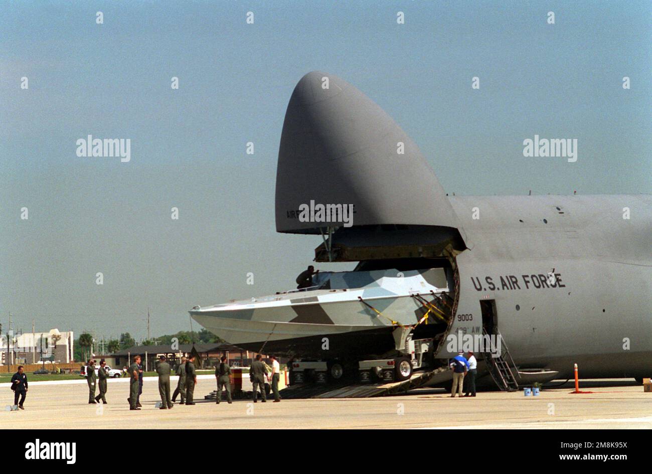 A Halter Marine Mark V combatant craft is offloaded from a USAF C-5A ...