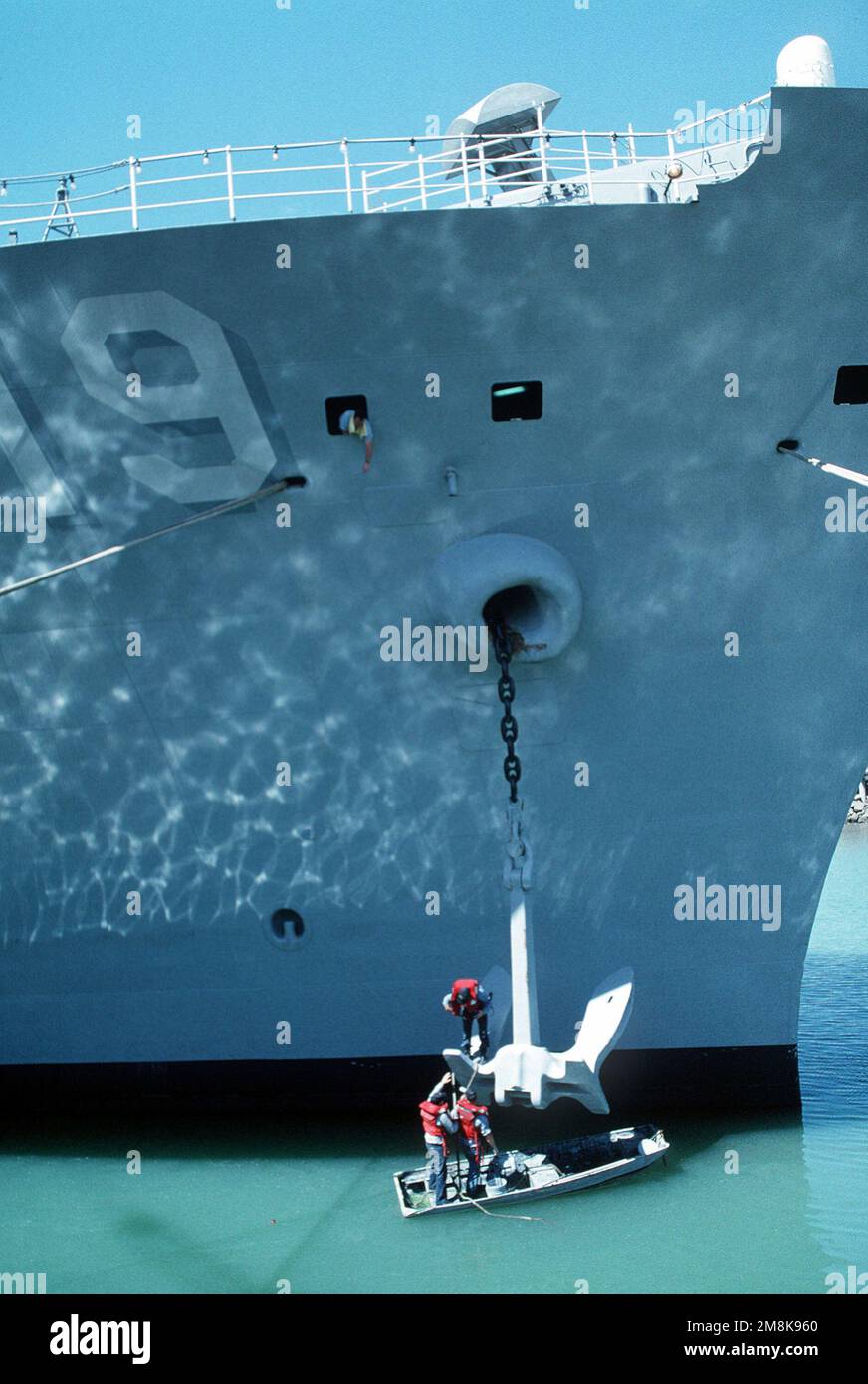 Members of the deck force of the amphibious command ship USS BLUE RIDGE ...