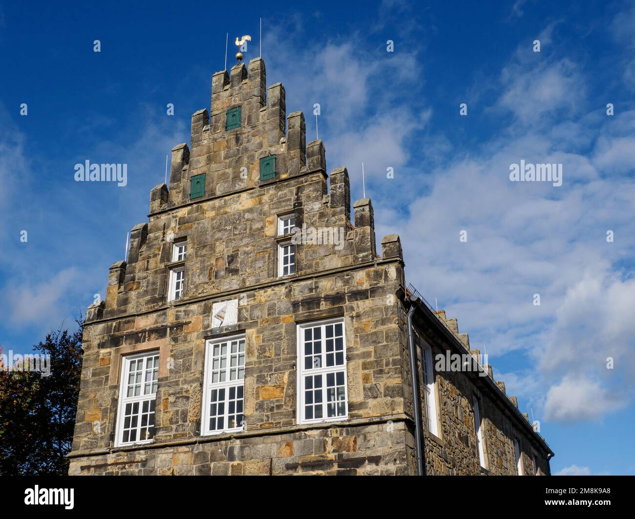The historical town hall in the center of Schuttorf at the Vechte River ...