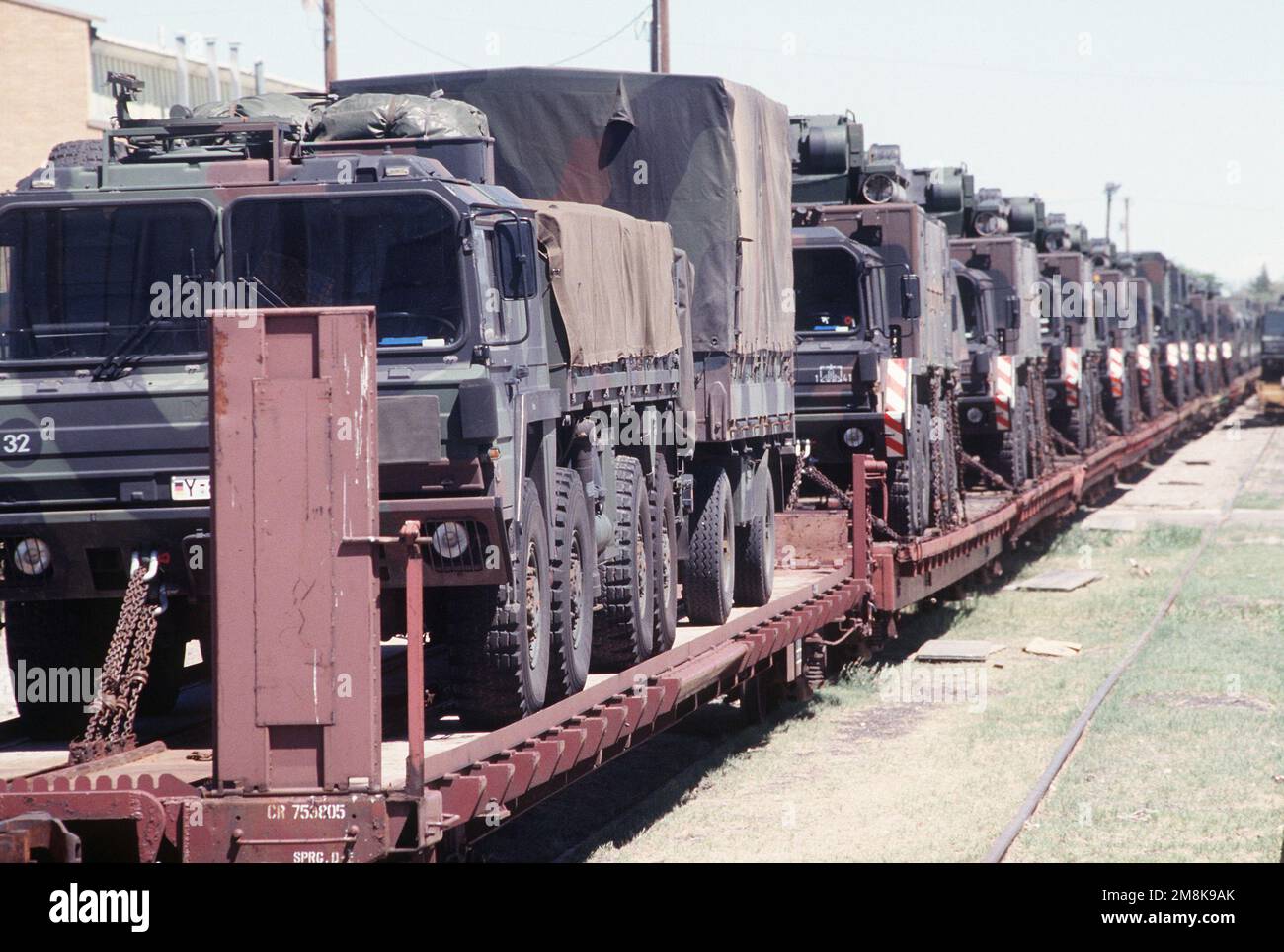 The United States Army train loaded with German Air Force trucks and ...