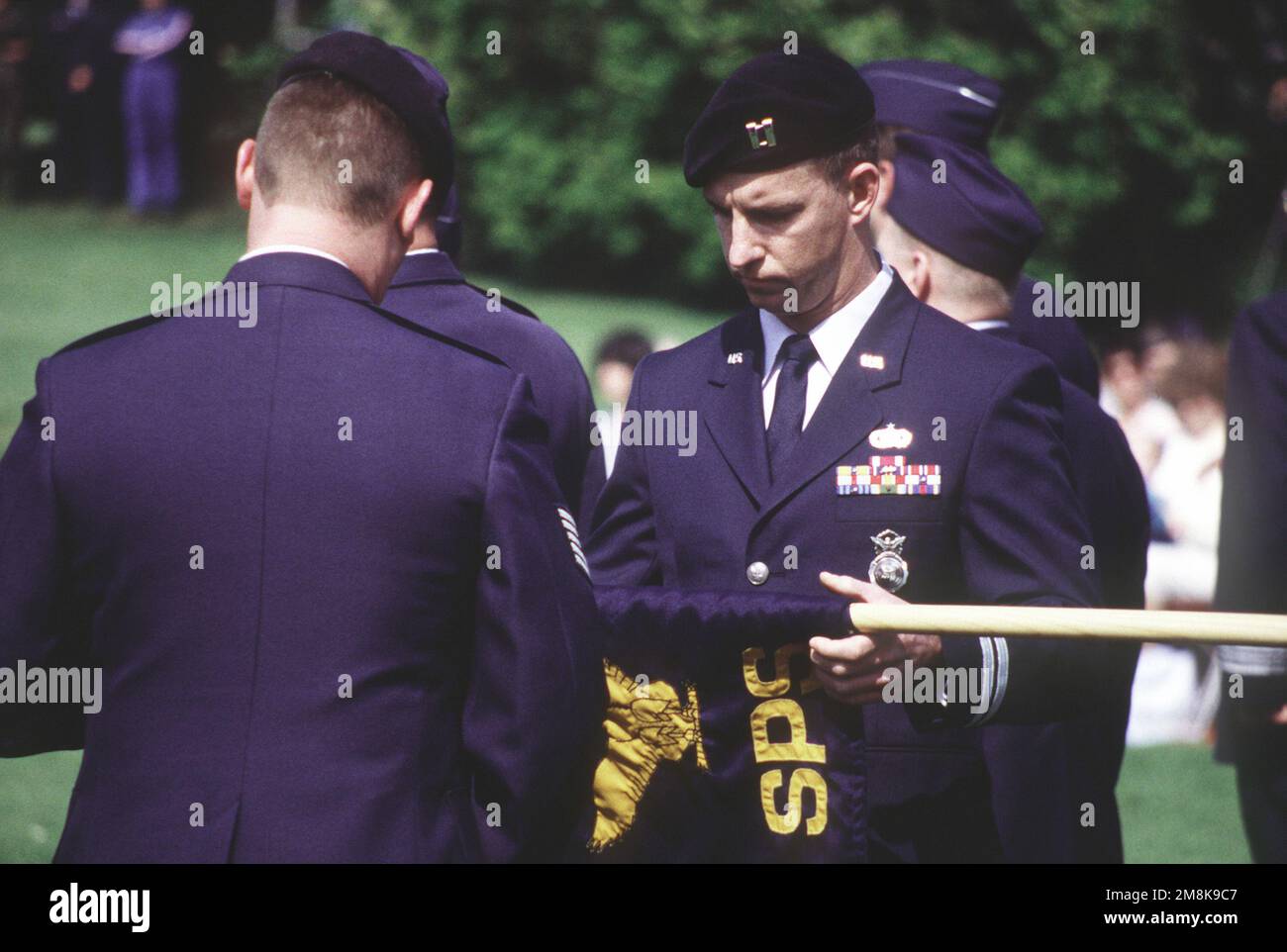 Captain Stephen L. Hutchens, 774th Security Police Commander, prepares ...
