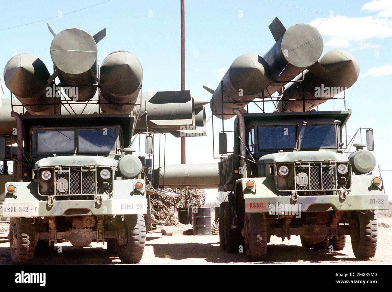 Make-shift SCUD missile launchers are mounted on top of two Army 5 ton ...