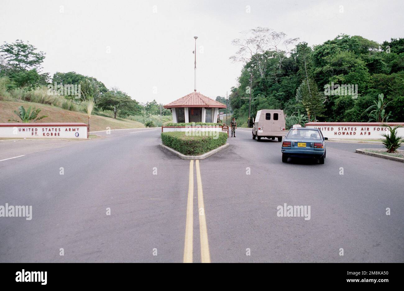 A medium-range view of the main gate including the base sign. Exact ...