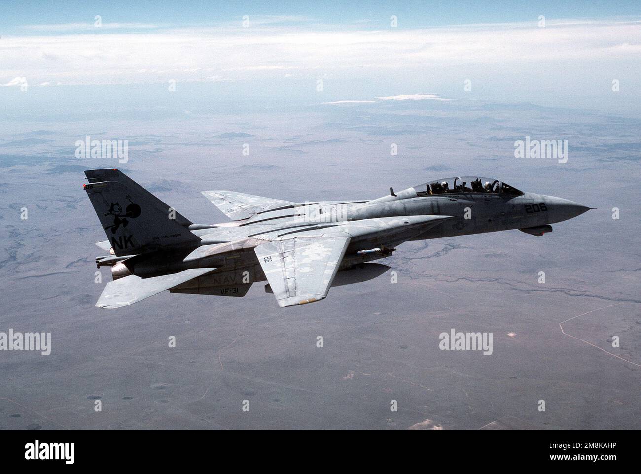 A side view of an F-14D Tomcat from the VF-31 Tomcatters as it flies a ...
