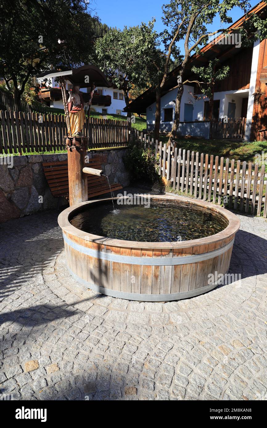 a wooden well with an old water pump Stock Photo - Alamy