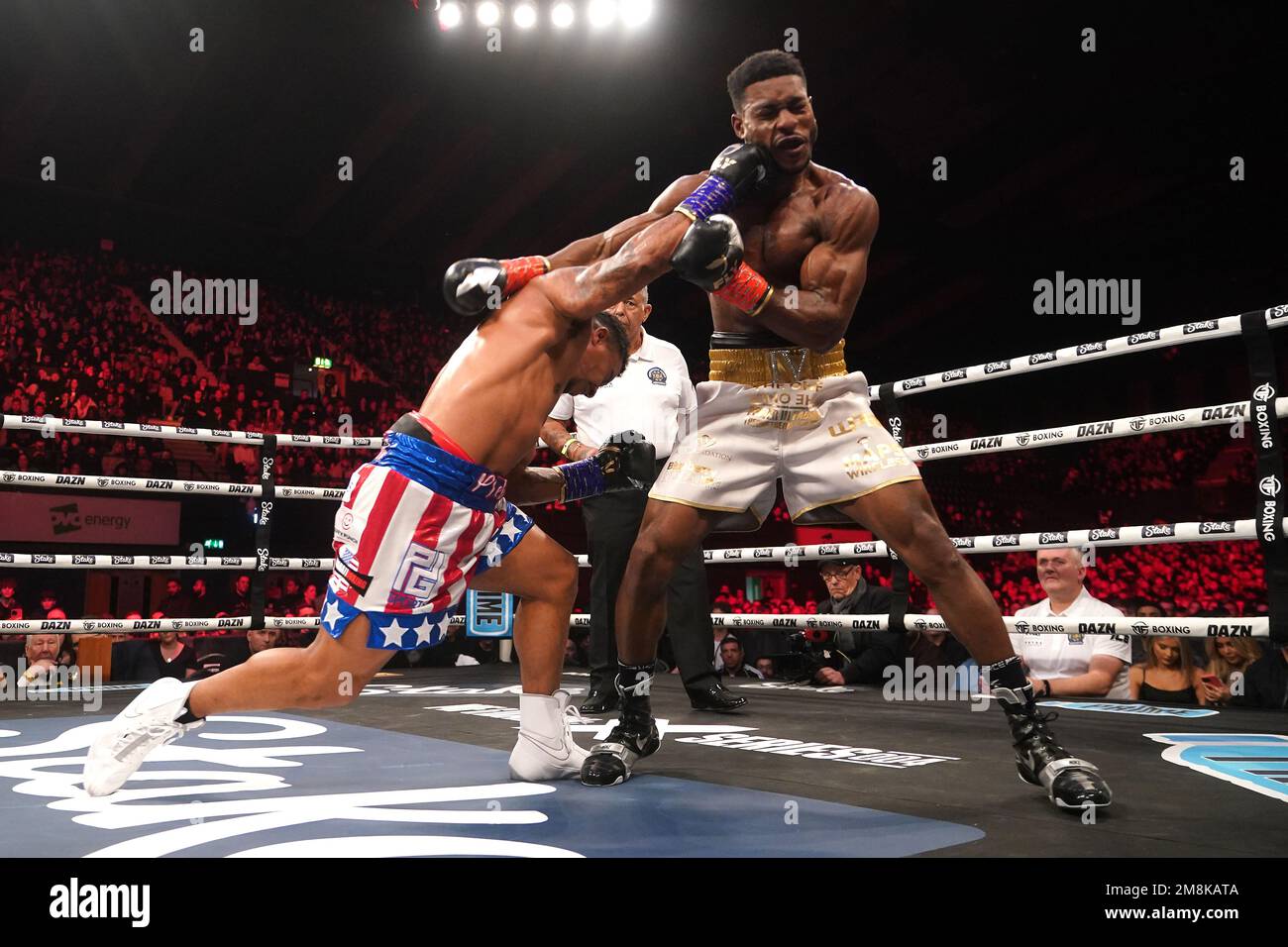 Anthony Taylor (left) strikes Idris Virgo during the light-heavyweight ...
