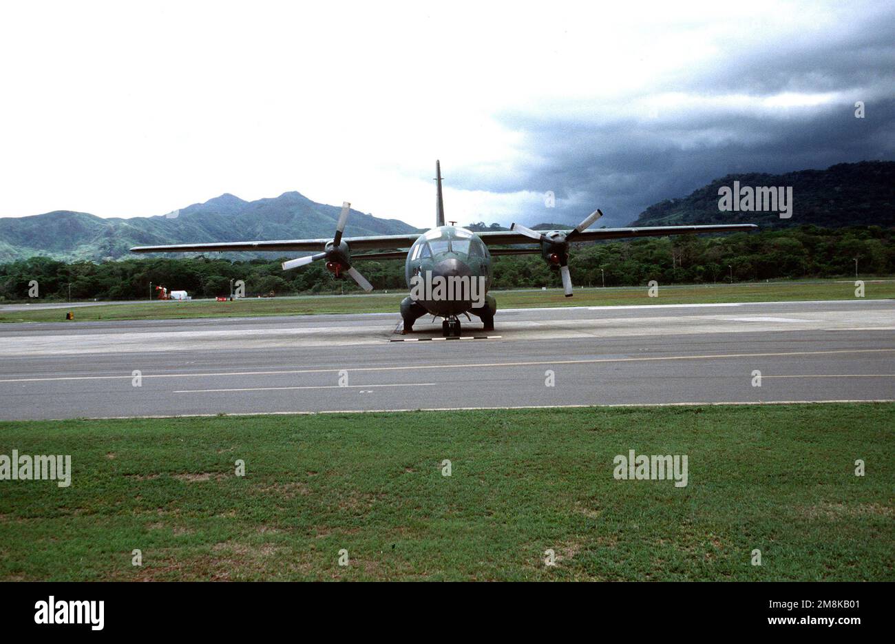 A medium-range, head-on view of a C-27A Spartan on the flightline. Base ...