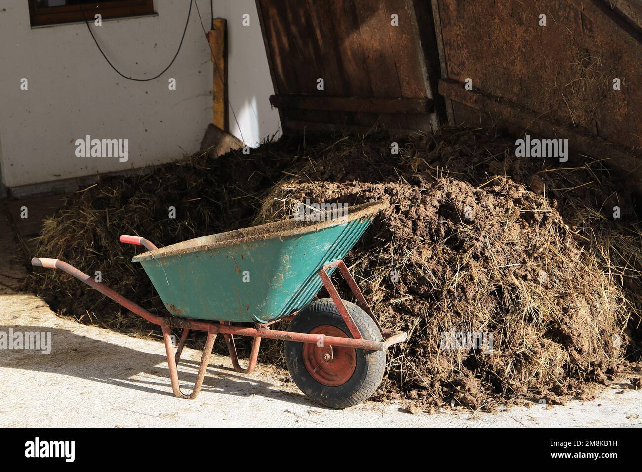 Stable hay wheelbarrow hi-res stock photography and images - Alamy