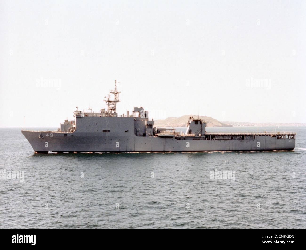 Low oblique port beam view of the dock landing ship USS HARPERS FERRY ...