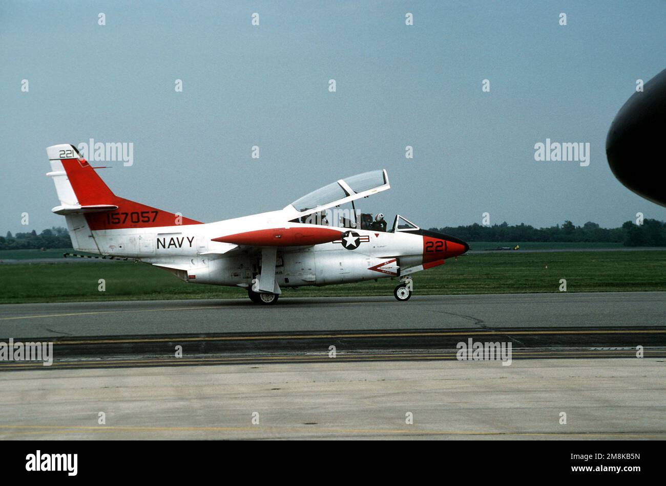 A right side view of a T-2C Buckeye trainer aircraft taxiing down the ...