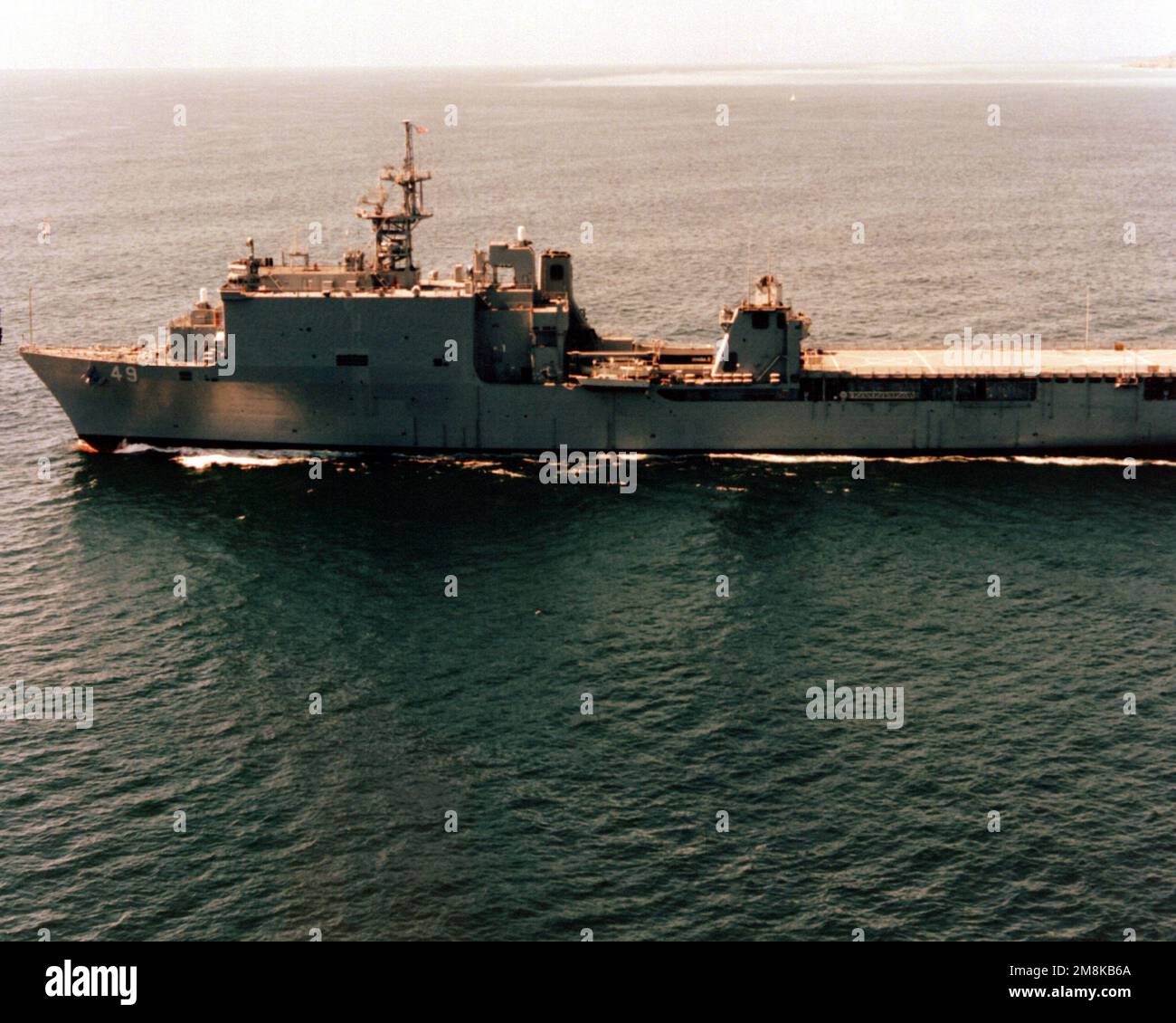 Aerial port beam view of the dock landing ship USS HARPERS FERRY (LSD ...
