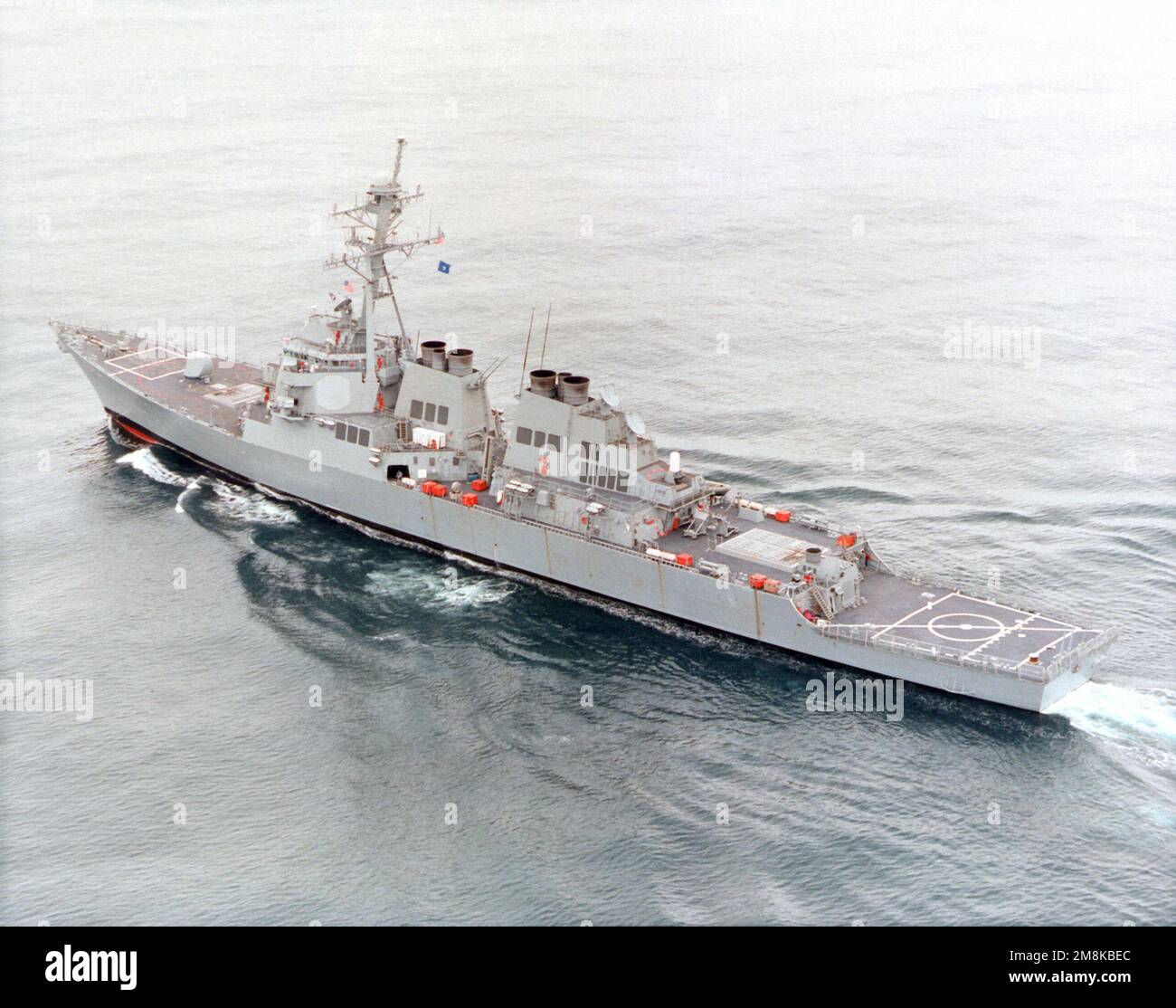 A high oblique port quarter view of the guided missile destroyer USS ...