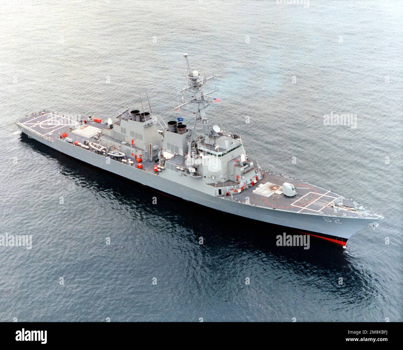 A high oblique starboard bow on view of the guided missile destroyer ...