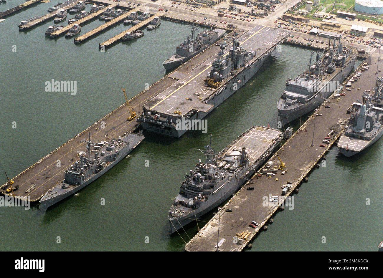 An aerial view of a section of the Naval Station showing piers 7 and 8 ...