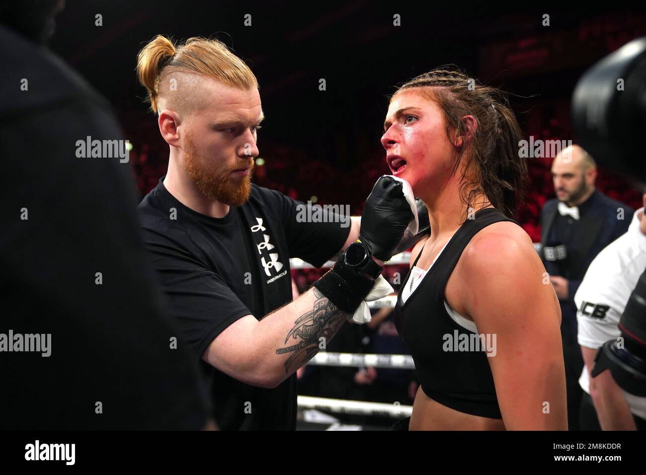Faith Ordway reacts after the referee stops the super-lightweight bout ...
