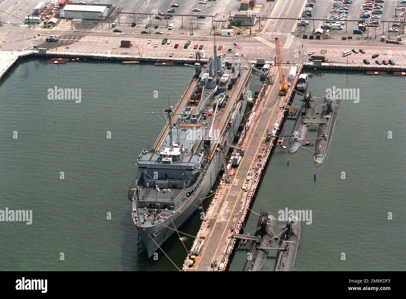 An aerial view of a section of the Naval Station showing destroyer and ...