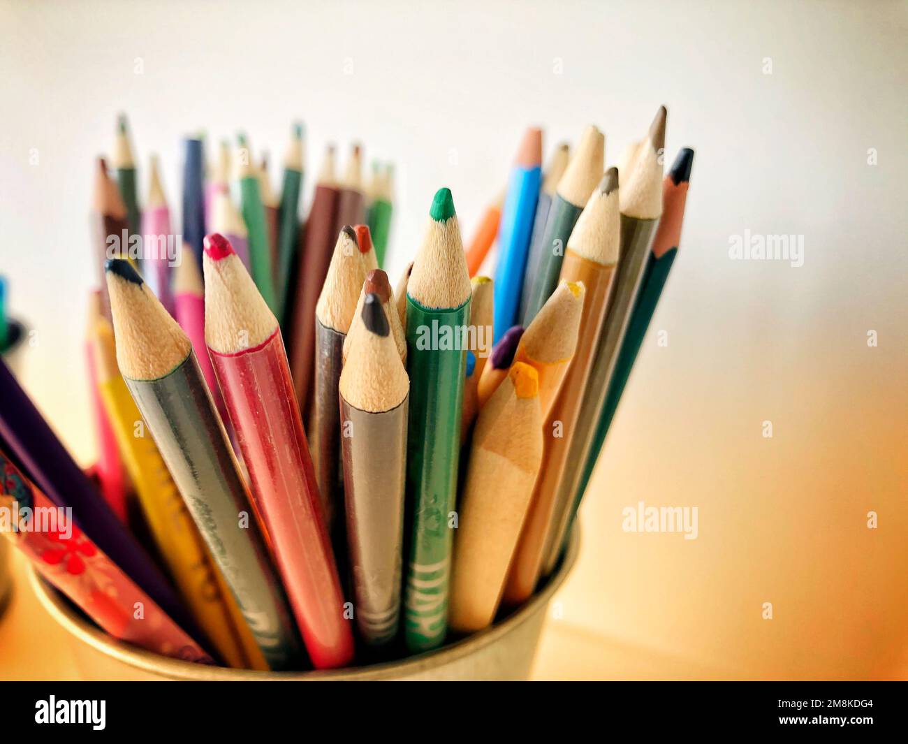 colored pencils in a jar Stock Photo - Alamy