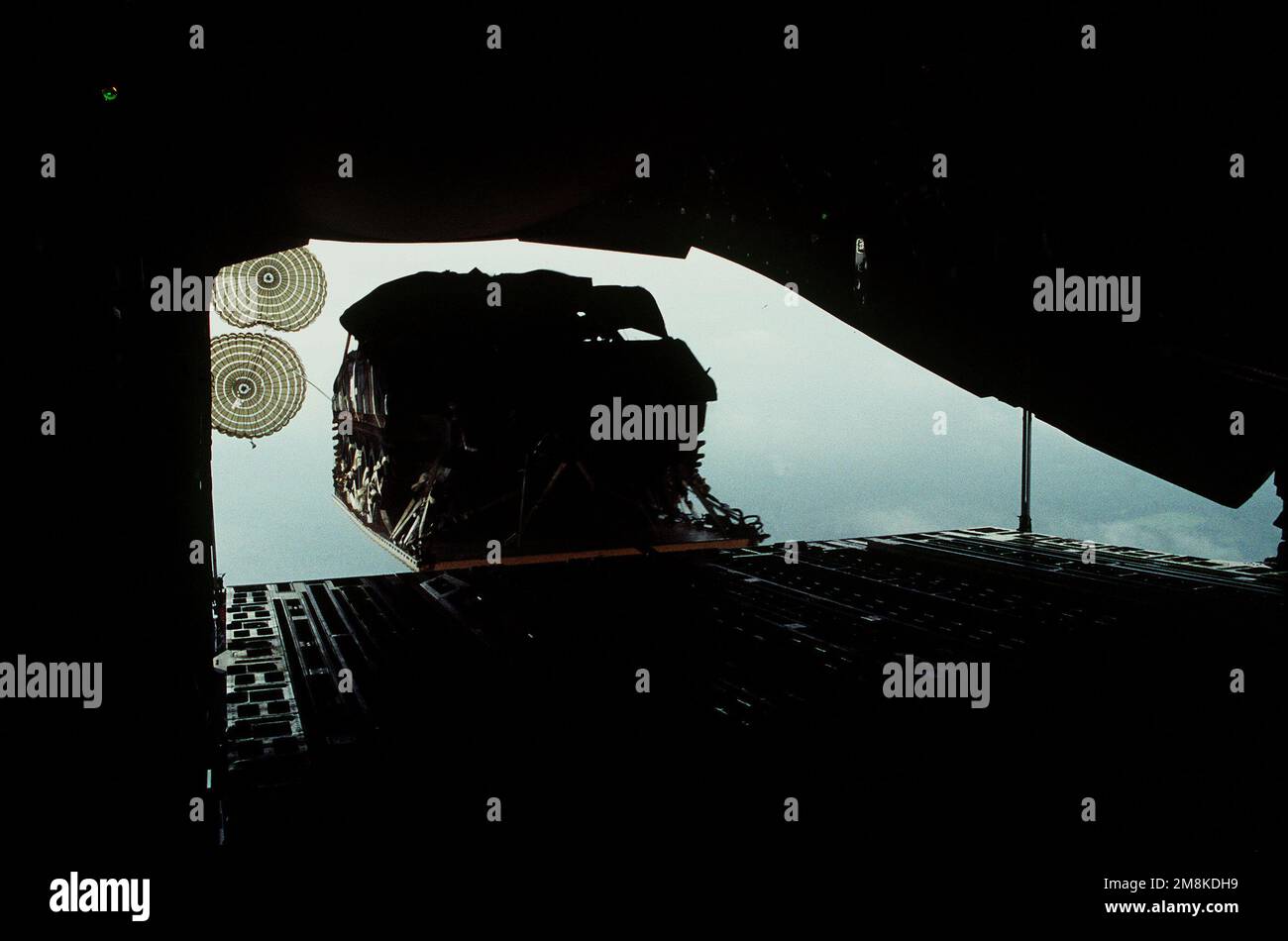 Two drogue parachutes yank a 20-ton U.S. Army M-551A1 Sheridan tank ...