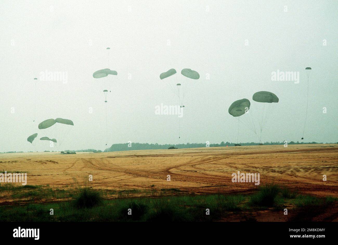 A U.S. Army High-Mobility Multipurpose Wheeled Vehicle (HMMWV) and ...