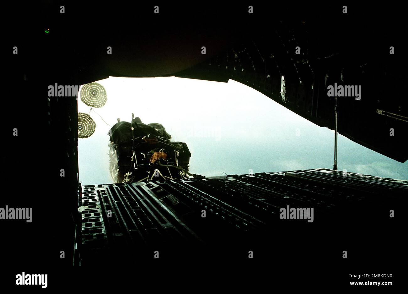 Two drogue parachutes yank a 20-ton U.S. Army M-551A1 Sheridan tank ...