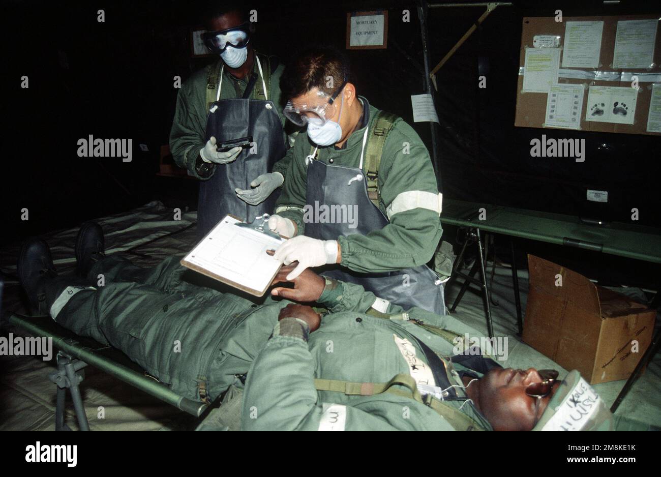 Mortuary personnel simulate identifying a body during the Operational ...