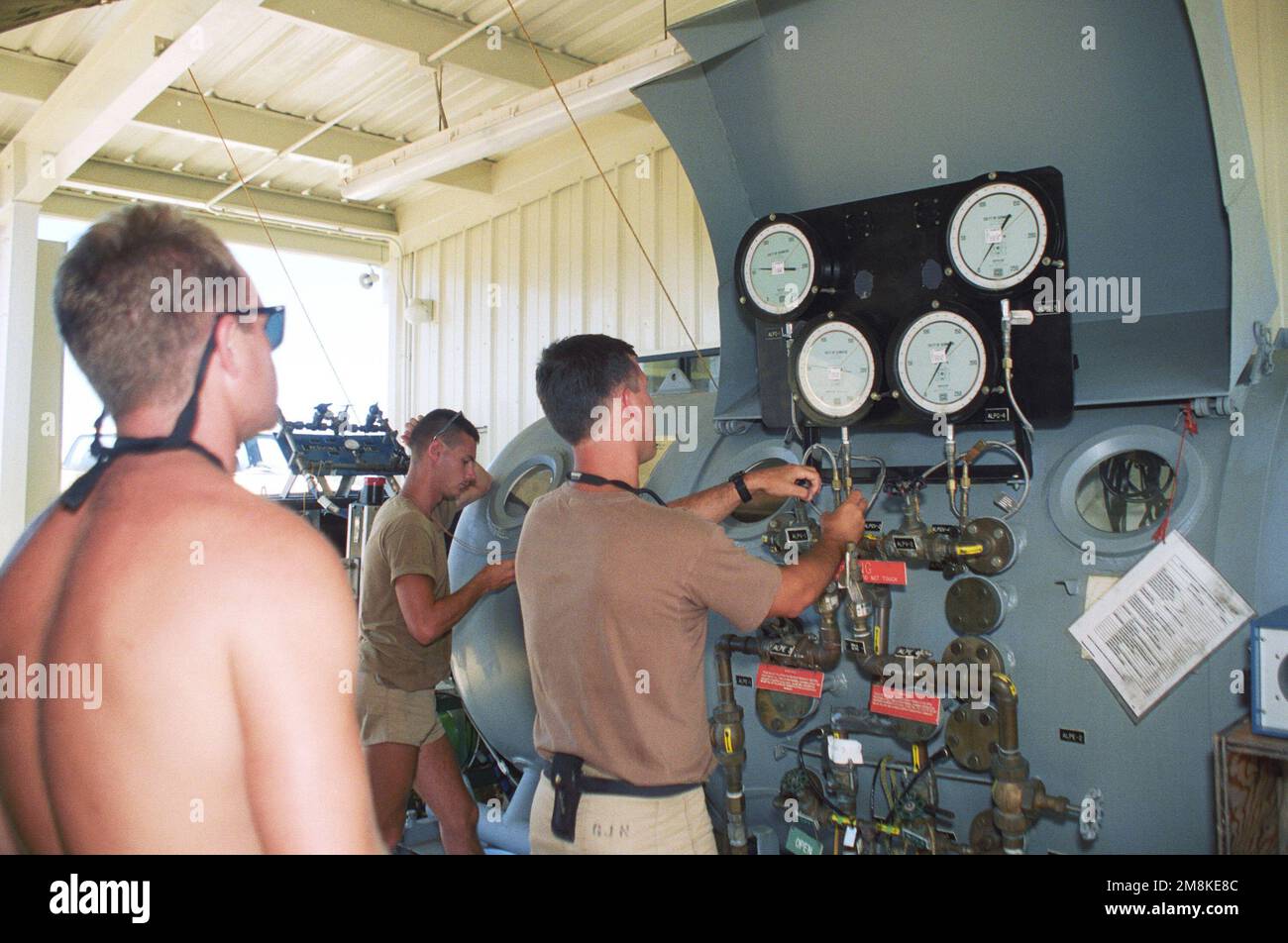 Members of Underwater Construction Team Two (UCT-2) train on running a ...