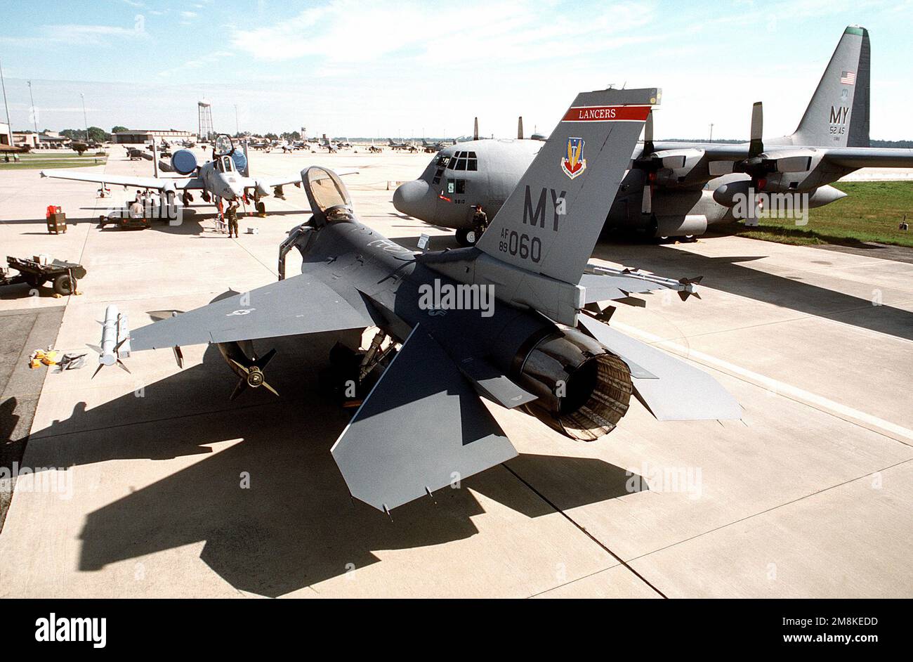 A USAF A-10 Thunderbolt aircraft (background), a F-16 Falcon aircraft ...