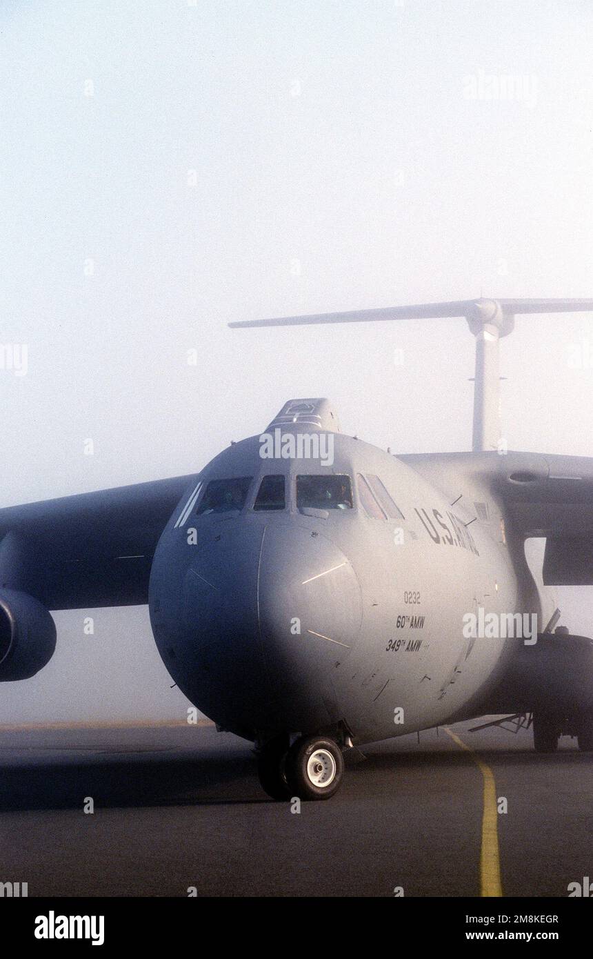 A C-141 Starlifter from the 60th Air Mobility Wing (AMW), Travis AFB ...