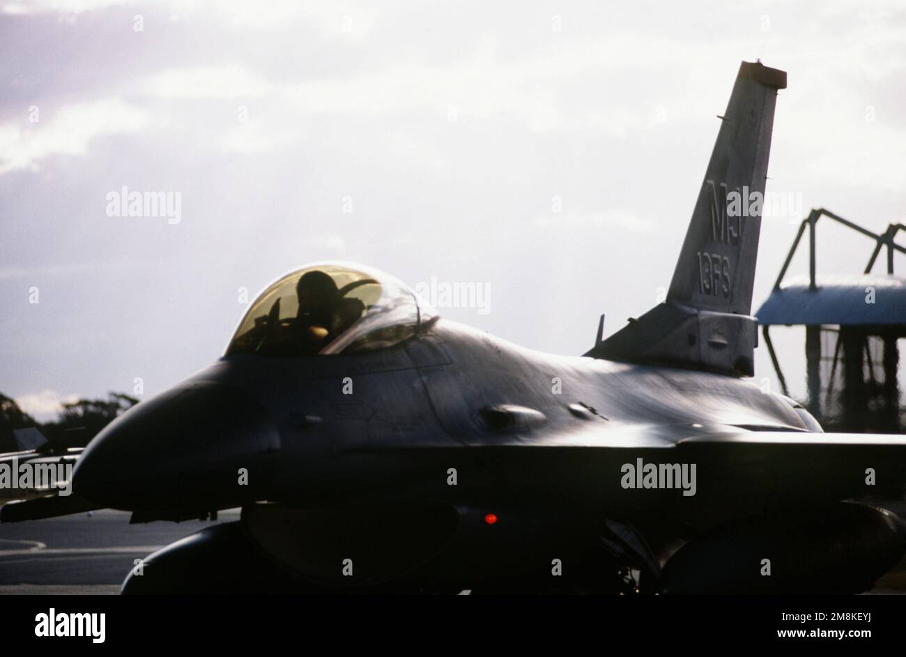 A close-up left side view of an F-16 Fighting Falcon from the 13th ...