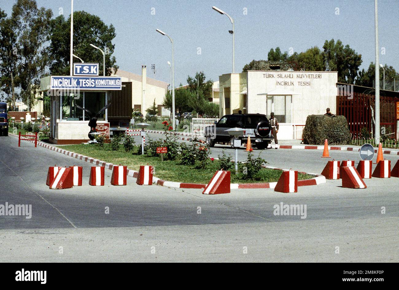 A medium-range view of the main gate looking west. The gate is ...