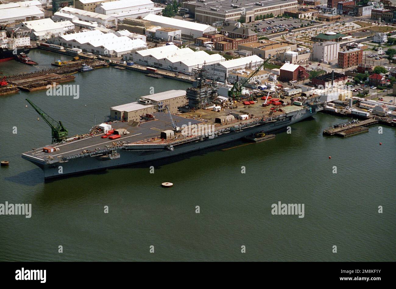 An aerial port bow view of the nuclear-powered aircraft carrier JOHN C ...