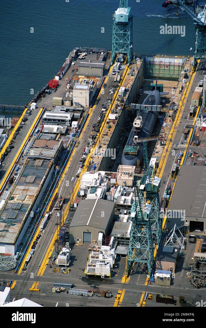 An aerial oblique view of a nuclear-powered attack submarine under ...